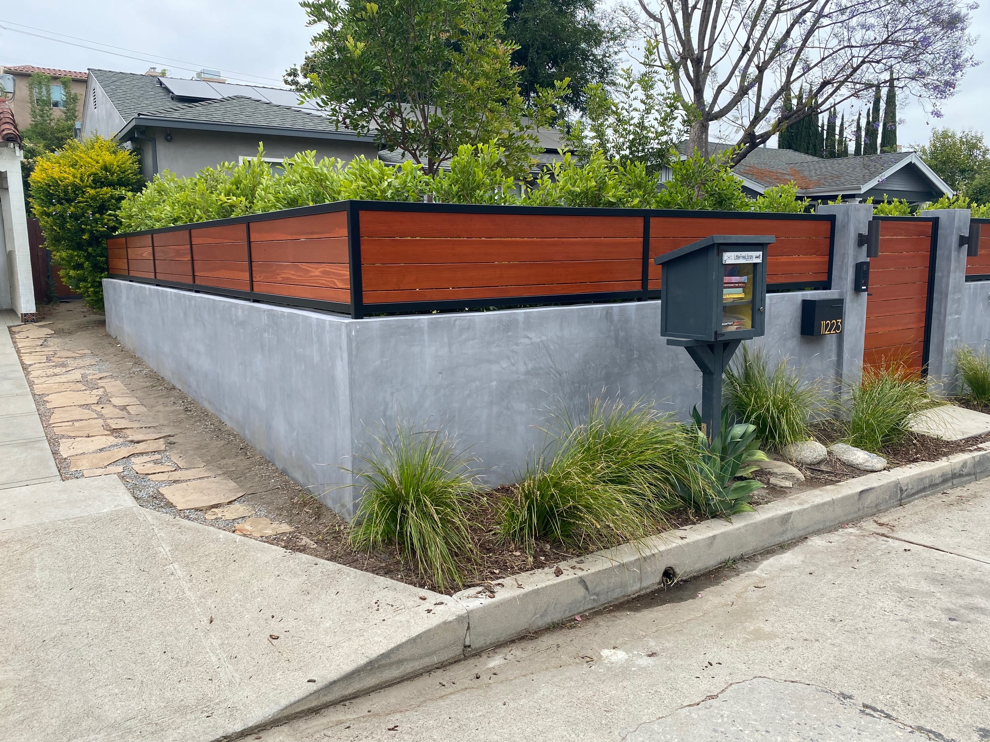 Electric driveway gates with solar panel