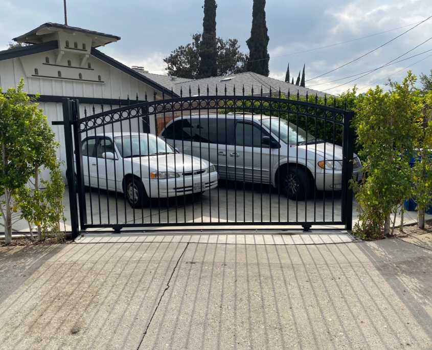 front gates with concrete fence - METHOD - Driveways gates & fences