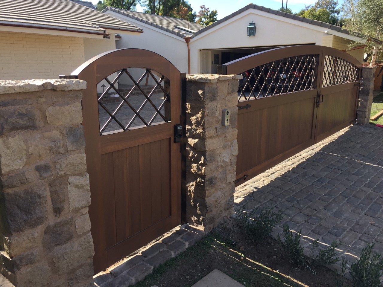 custom double swing gate metal frame covered by wood