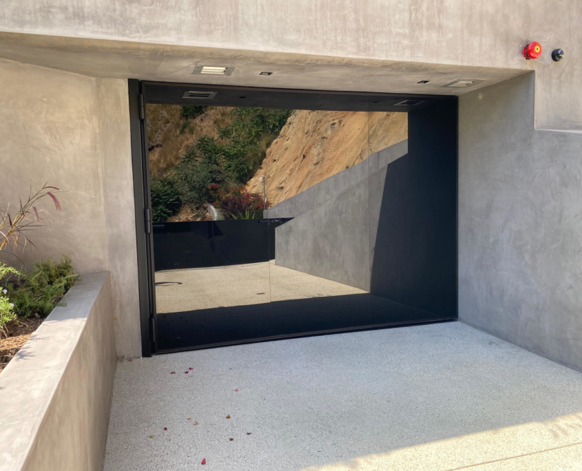 front gates with concrete fence - METHOD - Driveways gates & fences